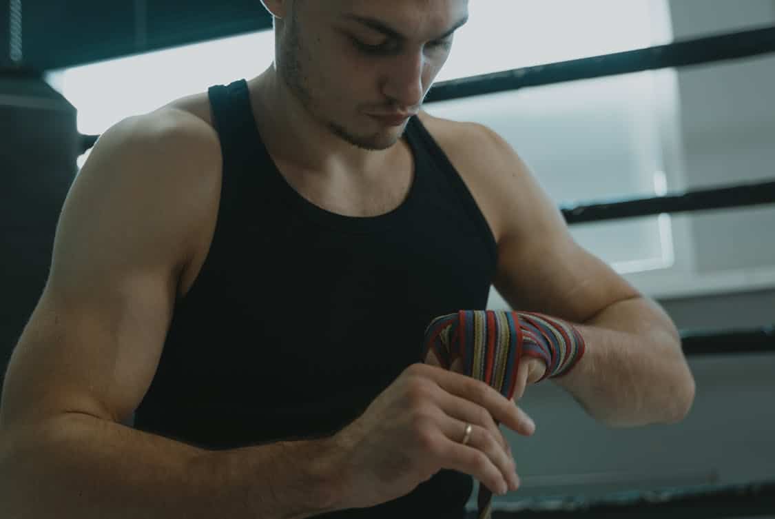 Why Do Boxers Wrap Their Hands Under Gloves? Discover Why - Origen Board